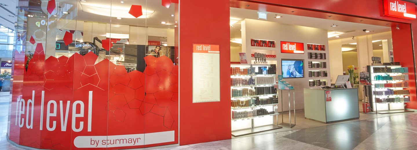 Red Level - The trendy, modern hairdressing salon at ATRIO Villach